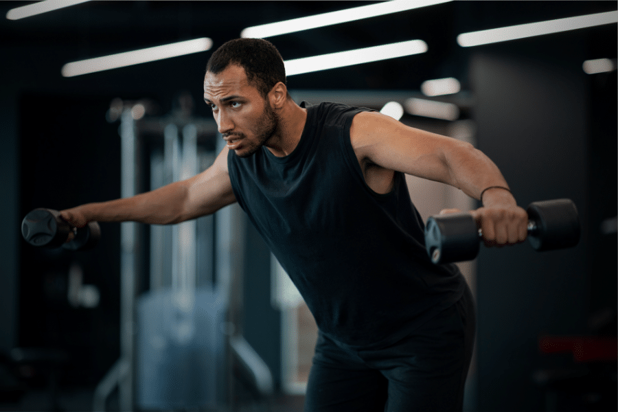 Side elevation with dumbbells: bodybuilding